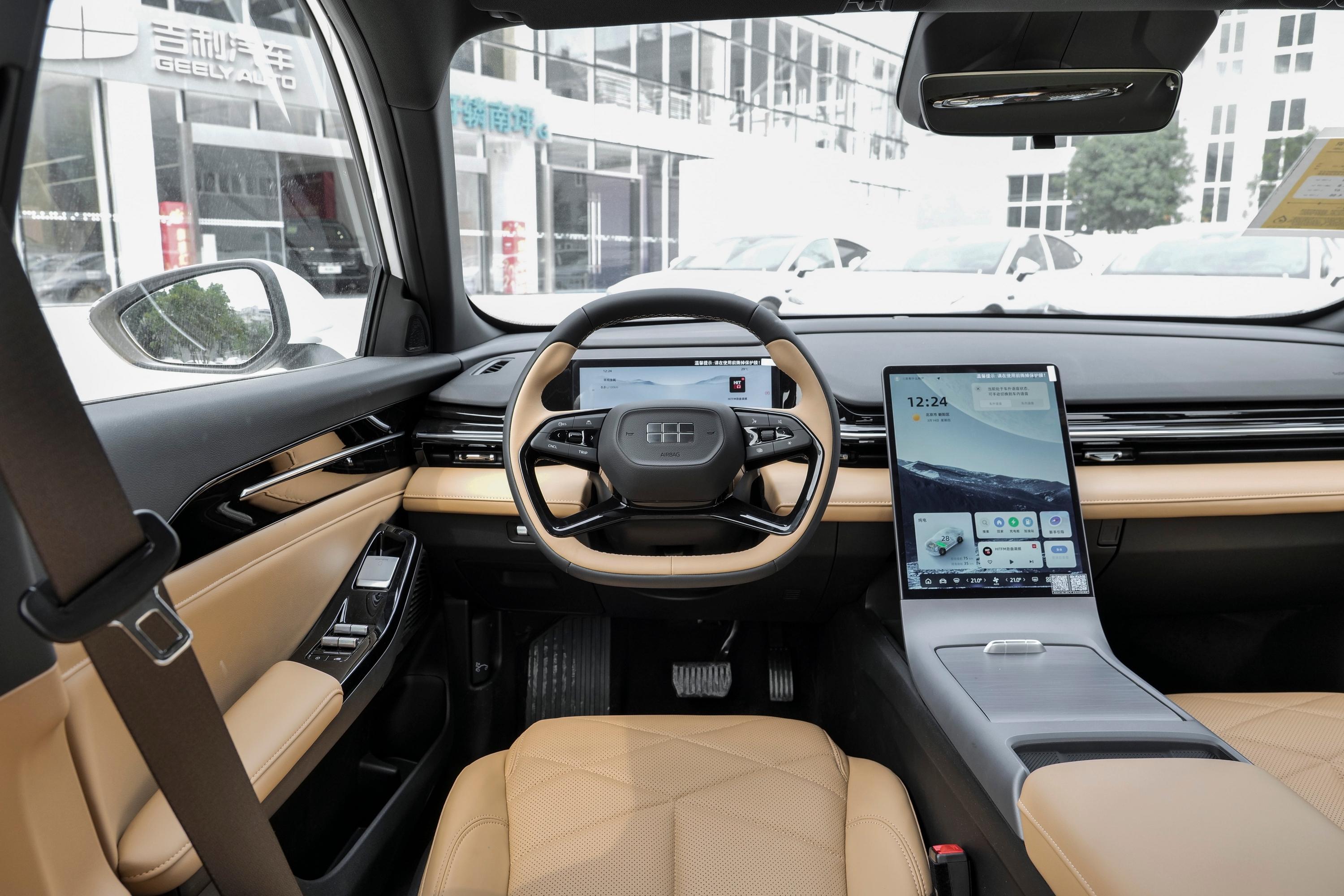 【银河L6龙腾版 1.5T 125km PLUS驾驶位区域图片-汽车图片大全】-易车