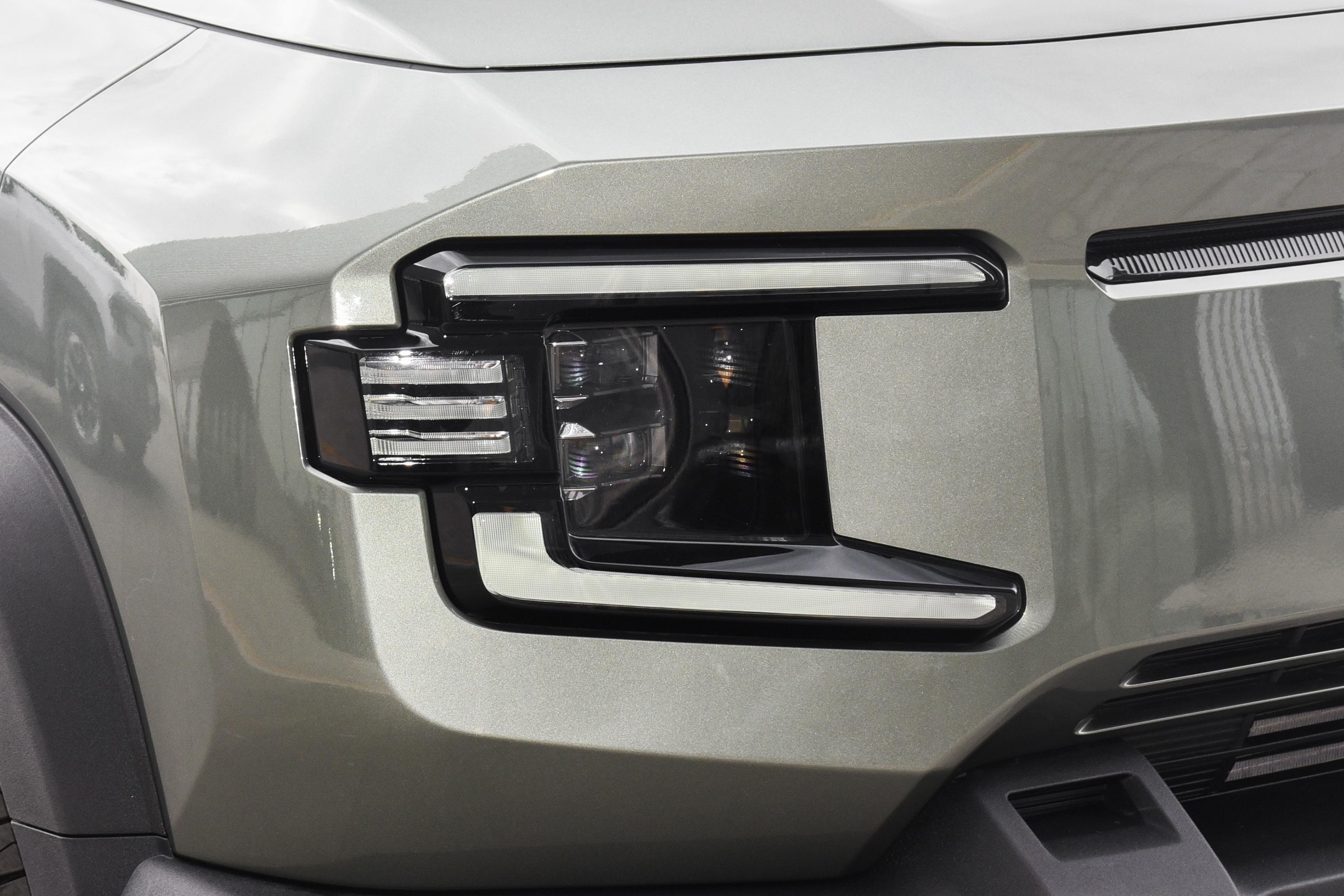 【深蓝G318174km 四驱空悬版大灯侧45度俯拍图片-汽车图片大全】-易车