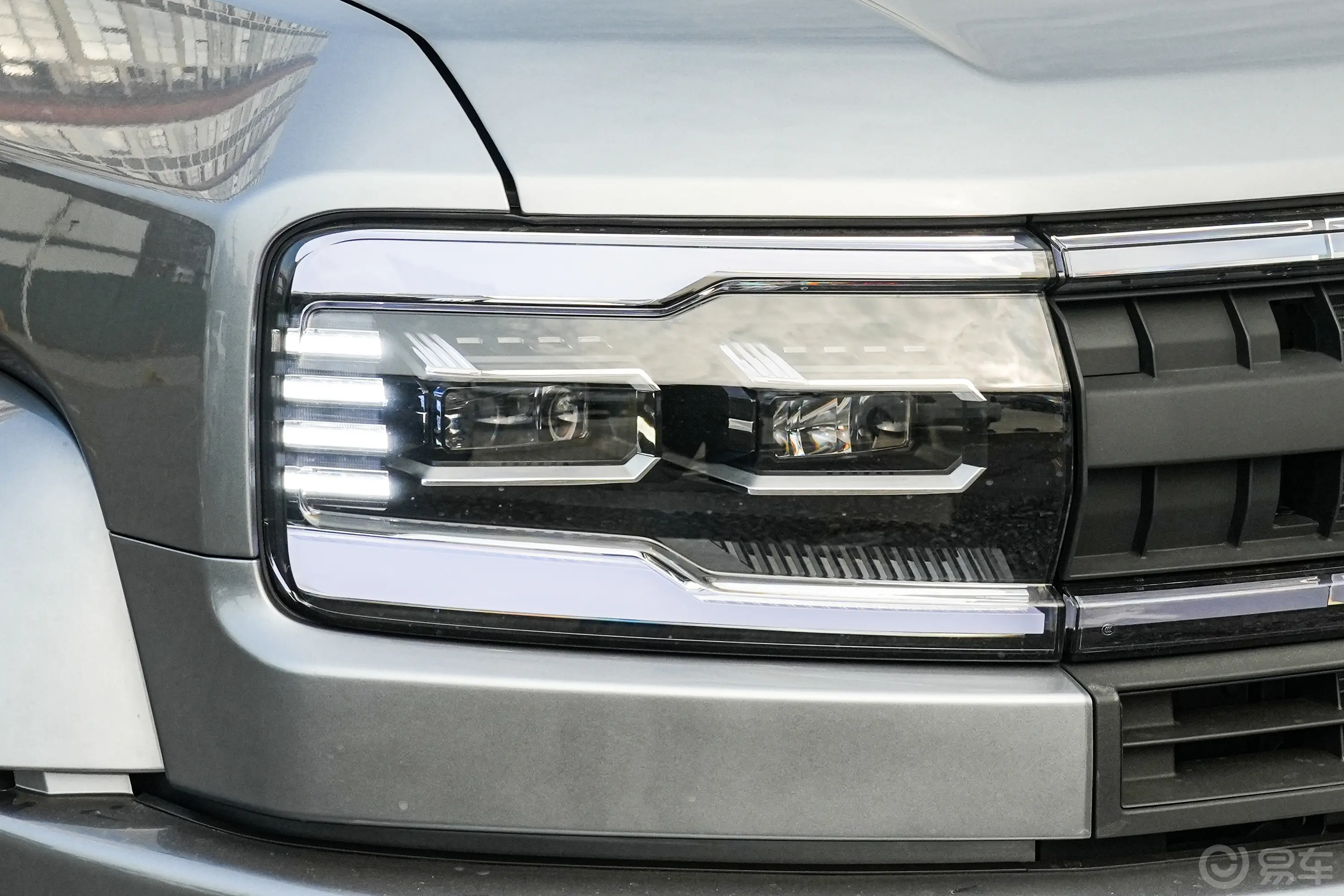 【豹51.5T 125km 天神智驾Ultra版大灯侧45度俯拍图片-汽车图片大全】-易车